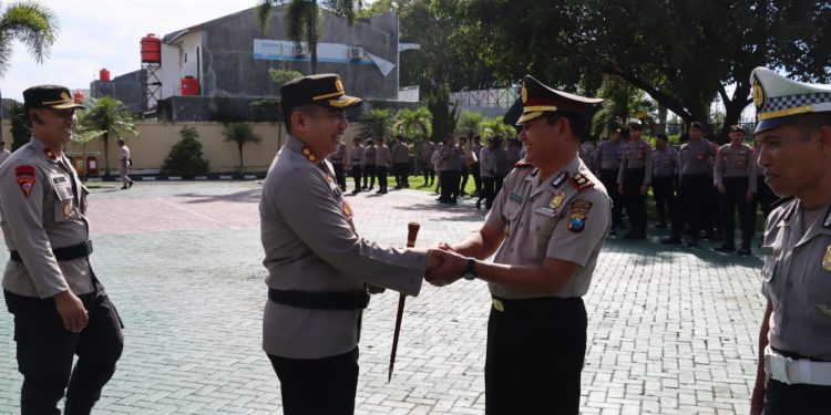 Kapolres Magetan Pimpin Upacara Korps Raport Kenaikan Pangkat Pengabdian - Tribratanews Polres ...